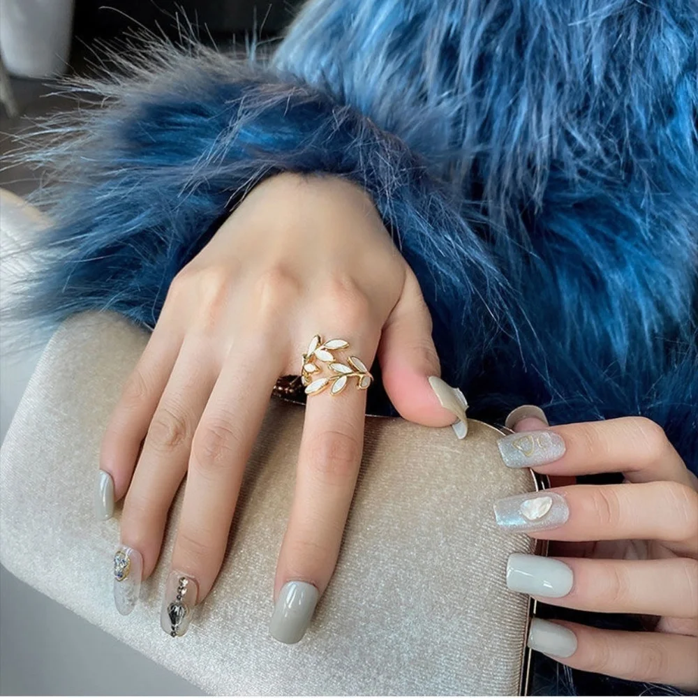 The Secret Pine | Jewelry | Besiana Gold X White Leaf Design Fashion ...